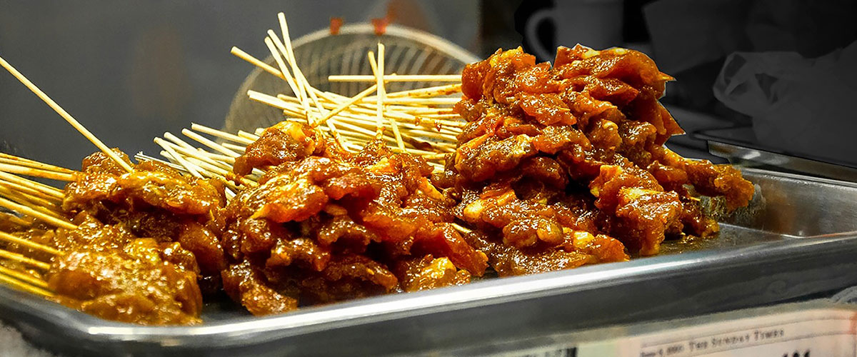 How One Hunky Hawker is Keeping Singapore's Hawker Culture Alive